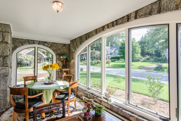 sunroom-stone-walls-historic-grove-park-home | ACM Design Architecture ...